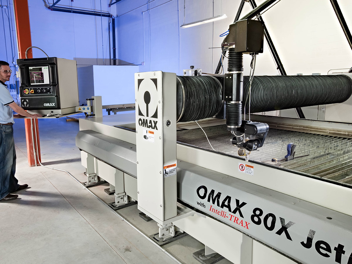 Custom Precision Tech in florida using OMAX 80X - OMAX Waterjet