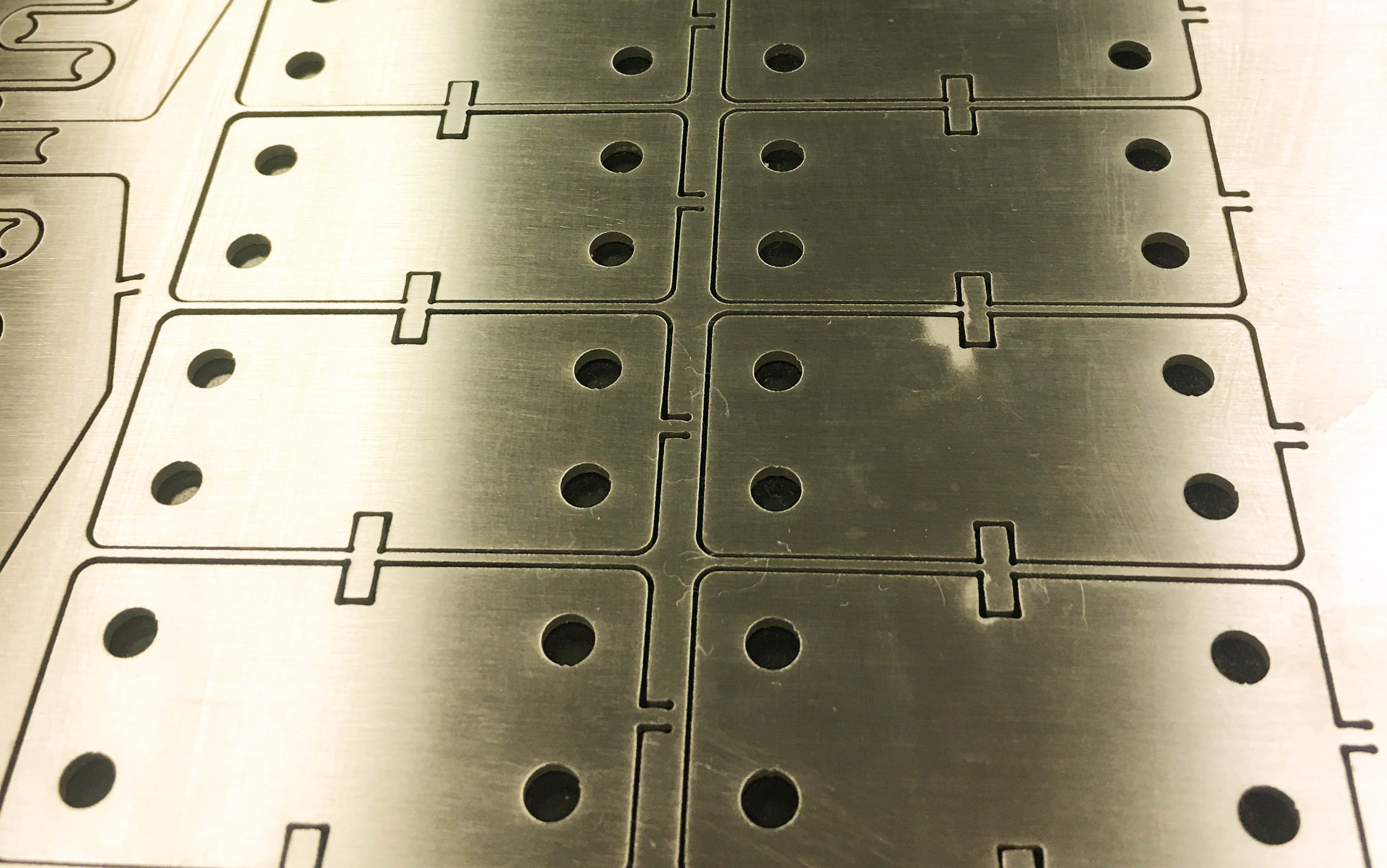 Precision Practices: Tabs and Bridges - OMAX Waterjet